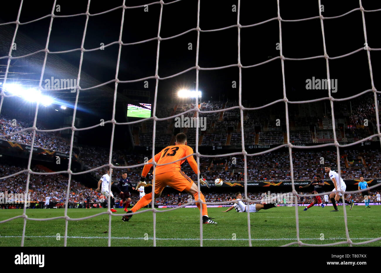 Arsenal's Alexandre Lacazette (third right) scores his side's second ...