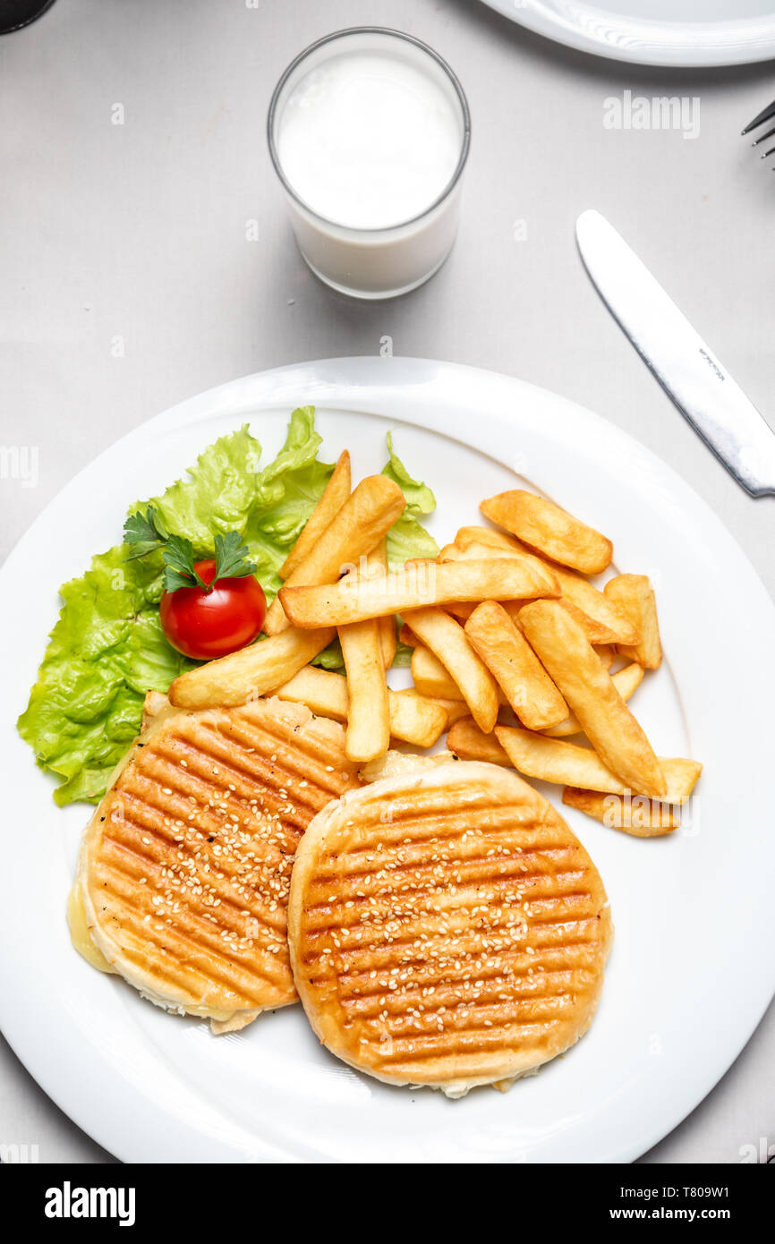 Toast Sandwich with french fries and garnish with yogurt Stock Photo ...