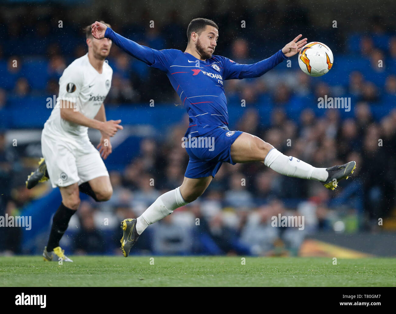 London, UK. 9th May, 2019. Chelsea's Eden Hazard (R) controls the ball ...