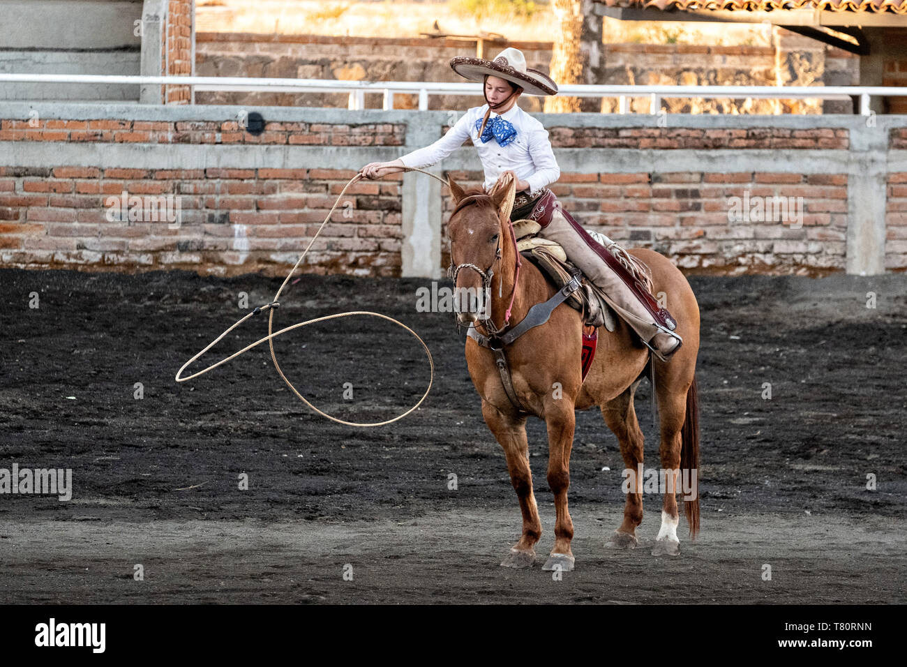 Juan Franco practices his rope skills during the family Charreria ...