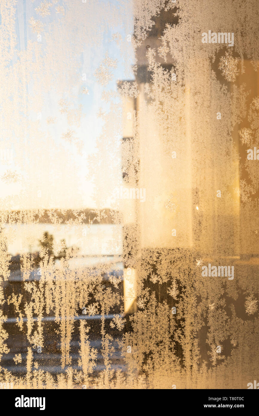 Frost in window at warm sunlight Stock Photo - Alamy