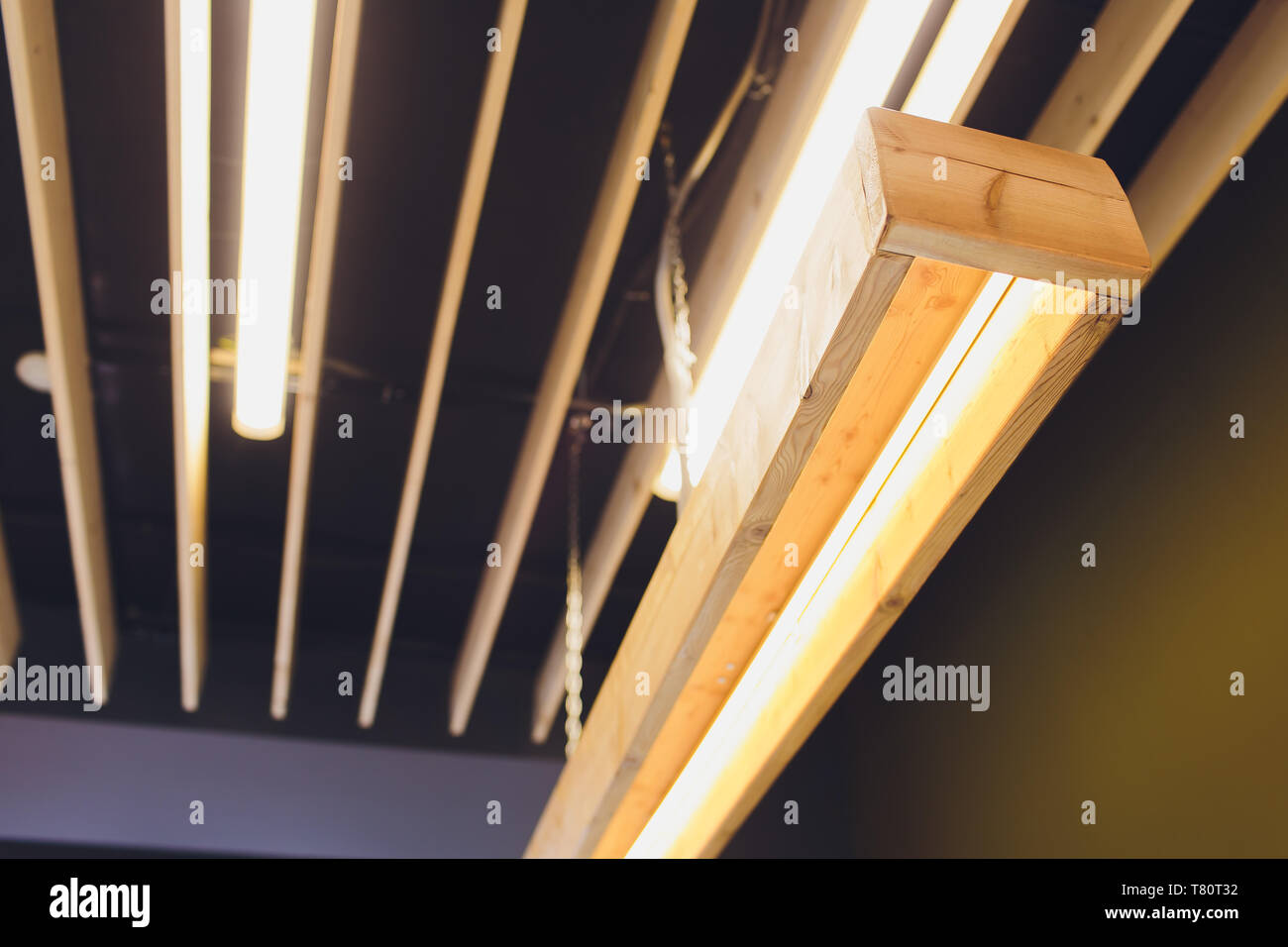 Long decorative lamps in the loft style. Toned Stock Photo - Alamy