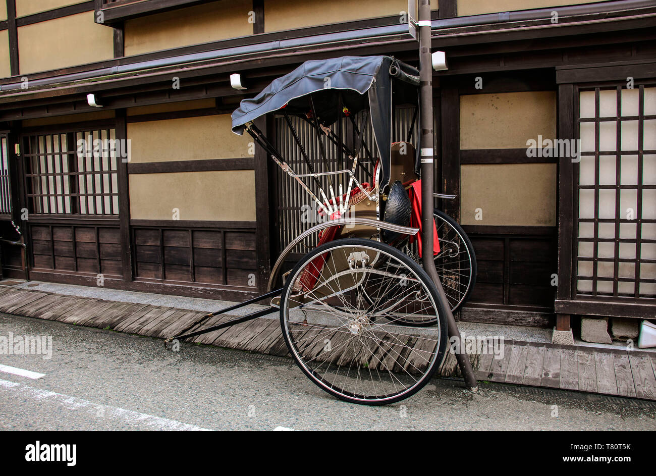 Traditional city scape of Takayama - carts for the travelers walking at ...