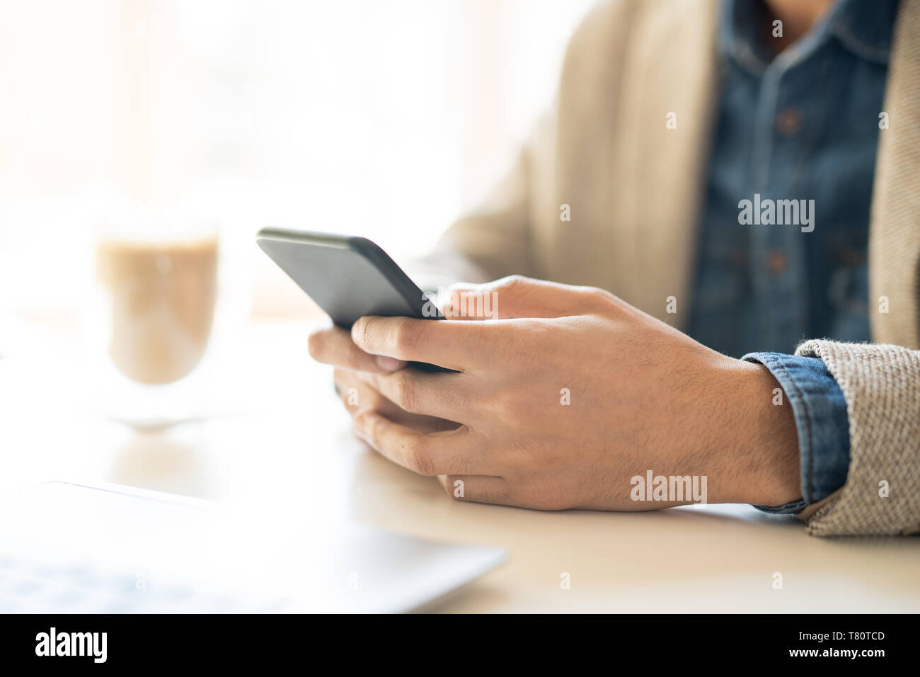 Using gadget young guy hi-res stock photography and images - Alamy