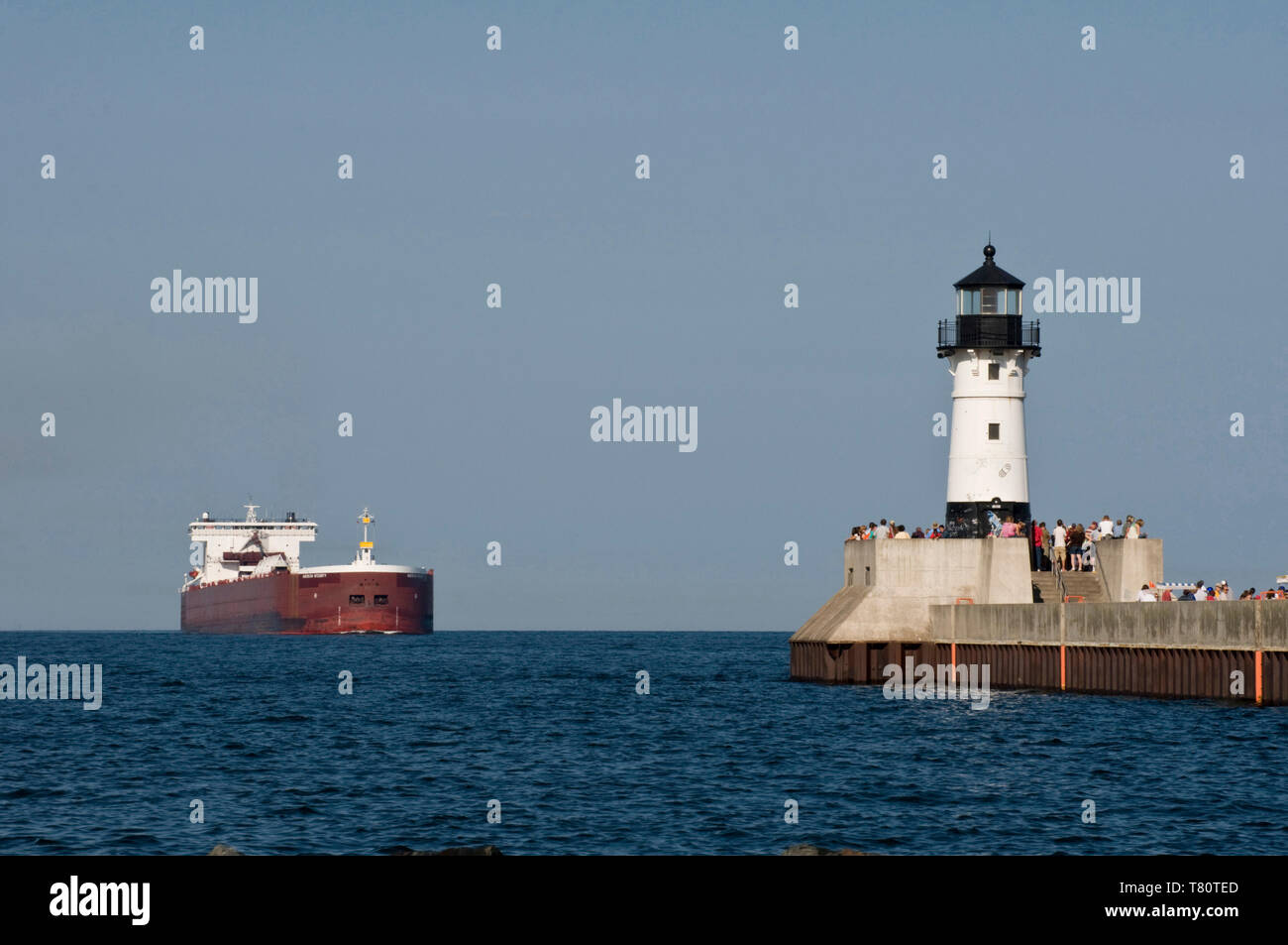 Duluth, Minnesota. Spectators watch as the 1000 foot freighter American ...