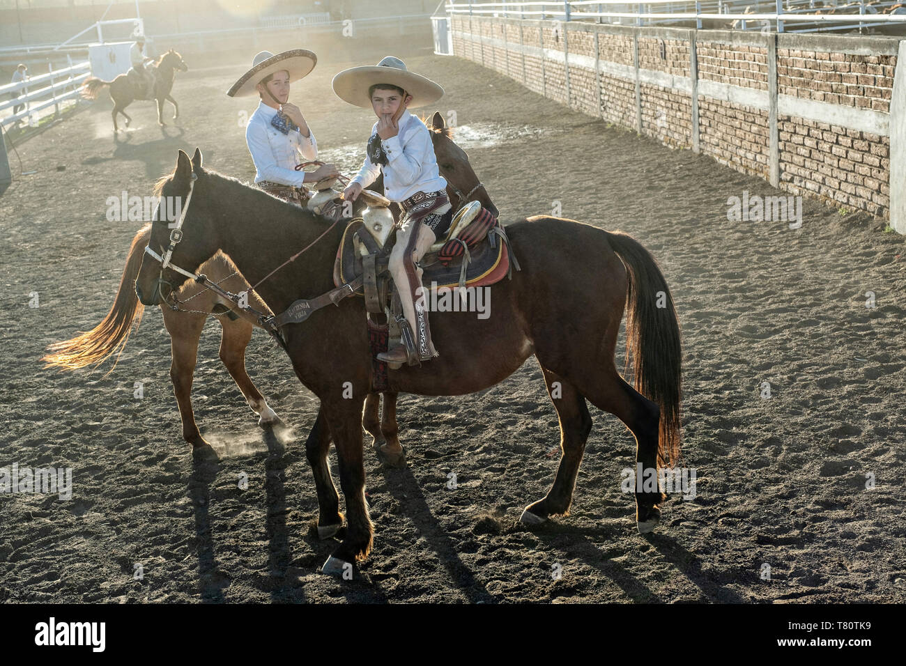 Luis Alfonso Franco, Jr., center, and his cousin Juan Franco, Jr. on ...