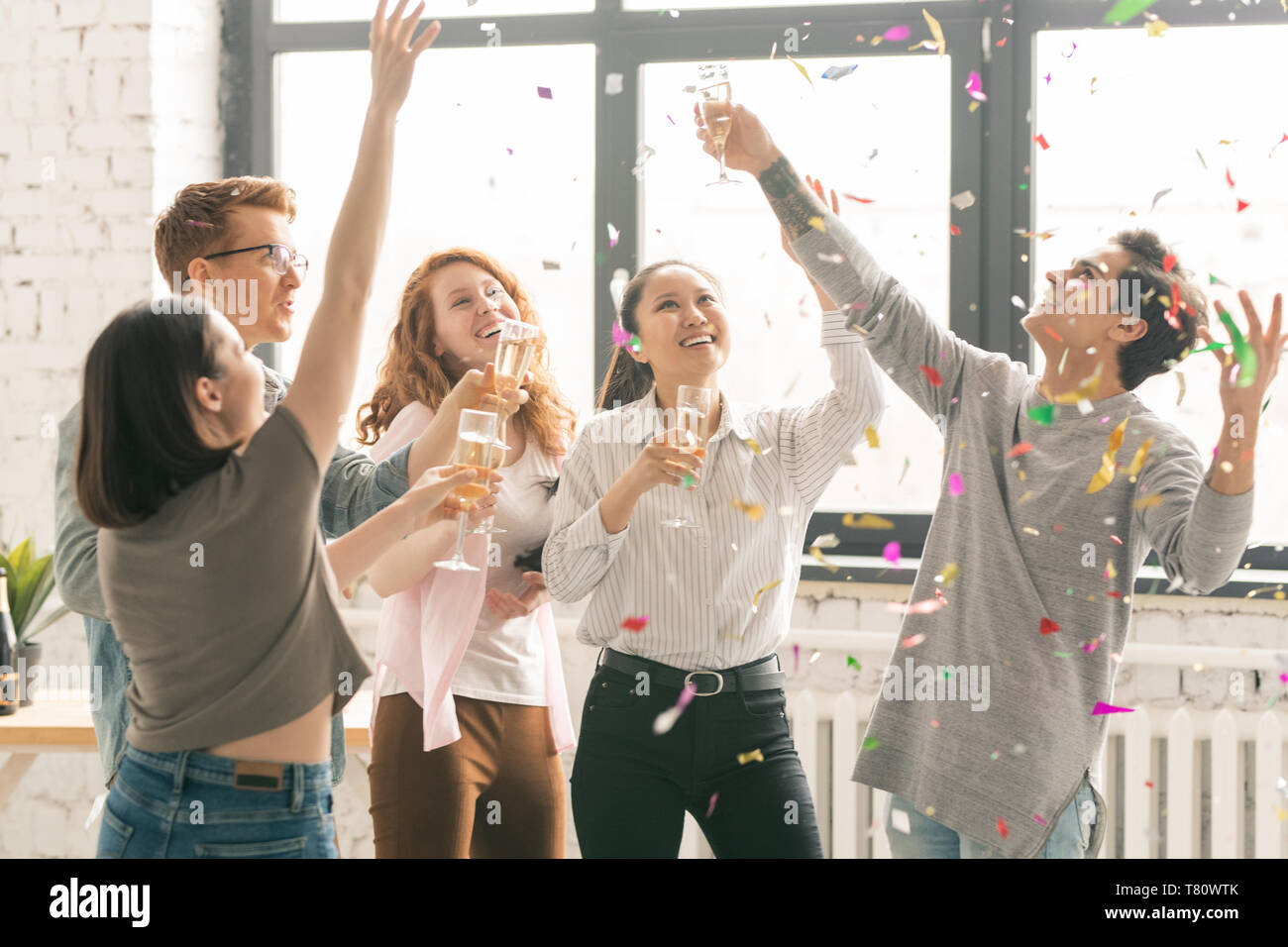 Celebration with confetti Stock Photo - Alamy
