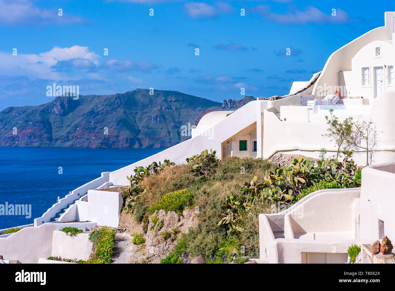 Santorini landscape with traditional whitewashed houses and view of ...