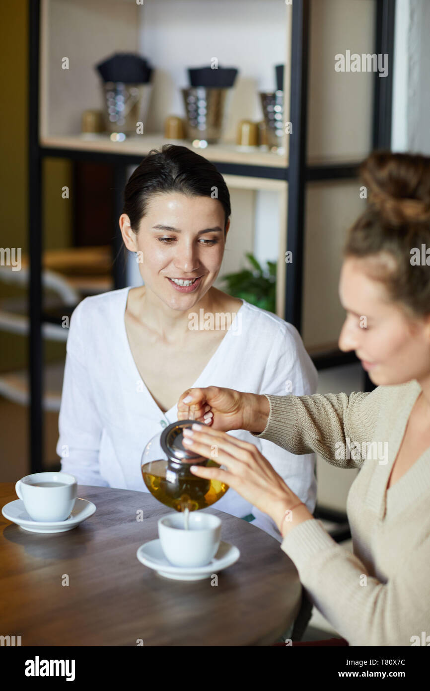 Having tea in cafe Stock Photo - Alamy