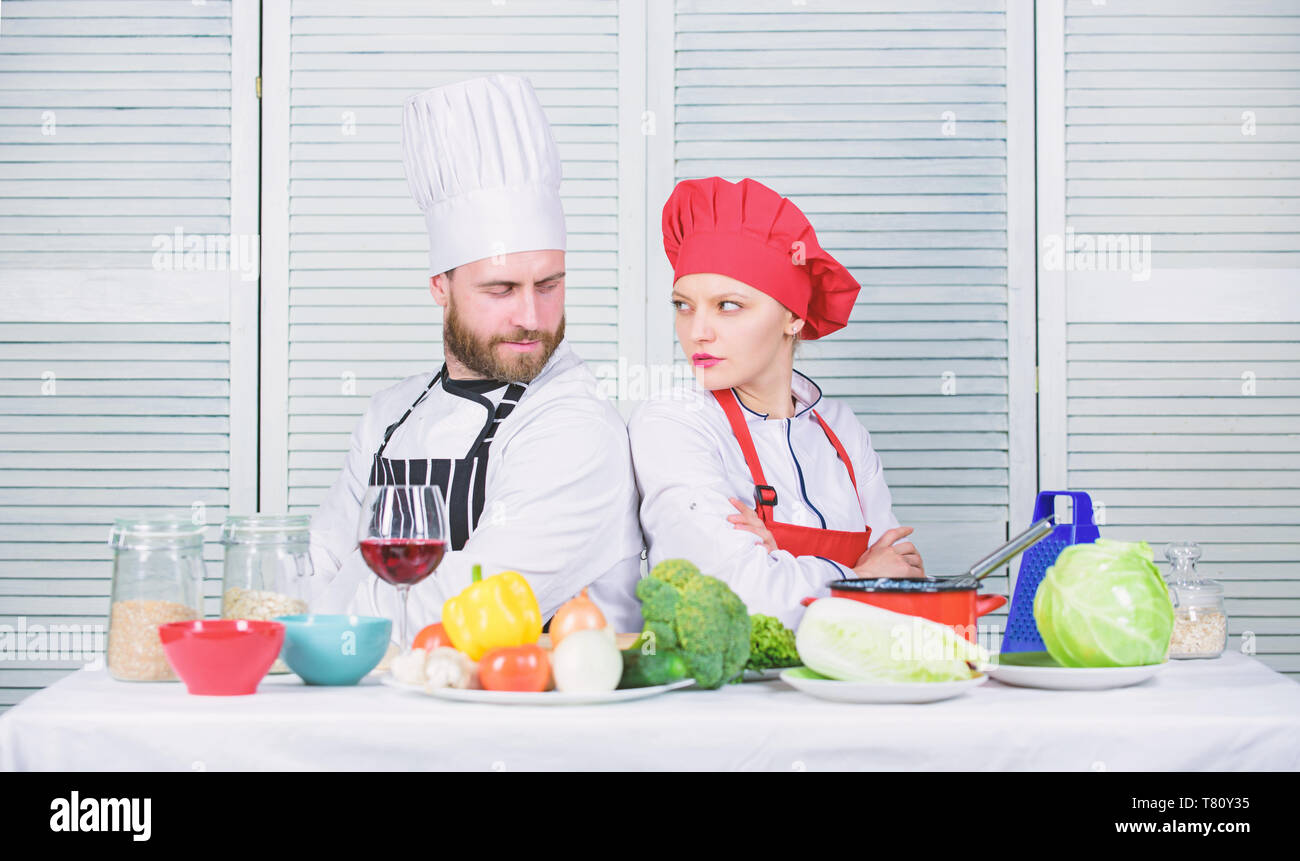 Culinary battle concept. Woman and bearded man culinary show ...