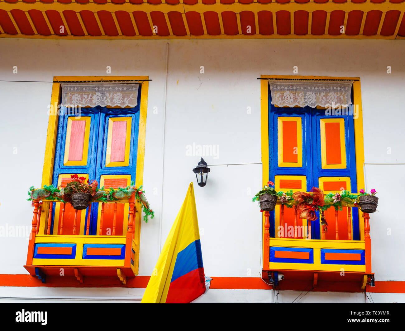 House painted in the colors of the Colombian flag (center), Filandia ...