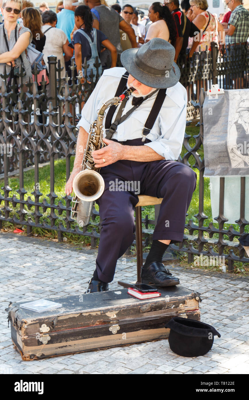 Man with saxophone hi-res stock photography and images - Alamy