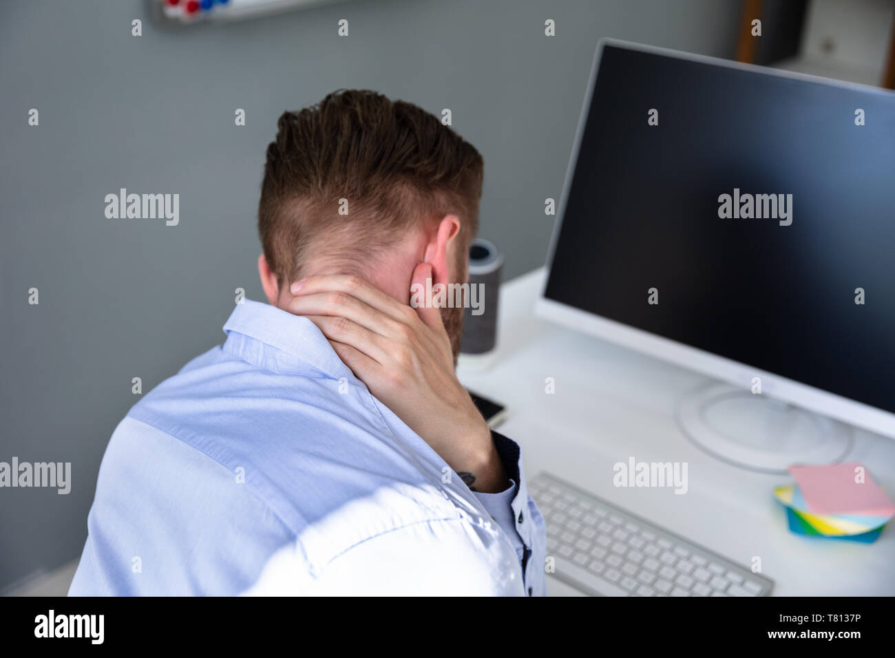 Stiff neck desk hi-res stock photography and images - Alamy