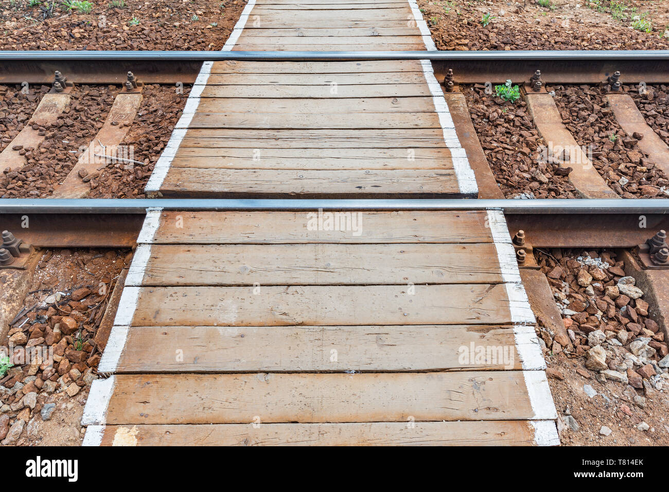 Railway cross on the big station at day time Stock Photo - Alamy