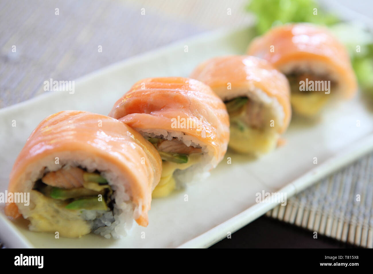 salmon sushi rolls Stock Photo - Alamy