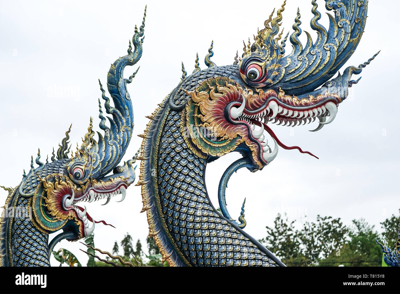 Statue in front snake temple hi-res stock photography and images - Alamy