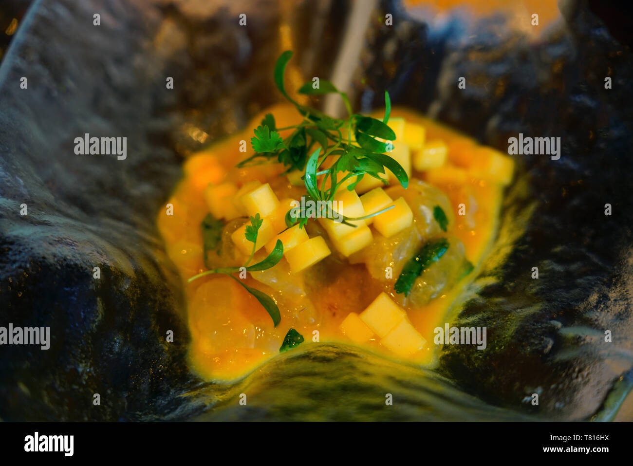 Dish of raw fish ceviche in marinade Stock Photo - Alamy