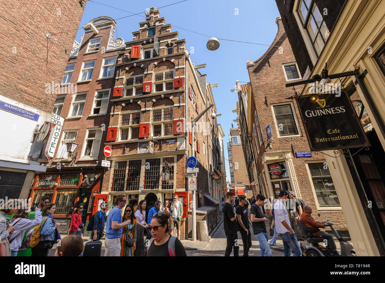 People at streets of Amsterdam during spring time Stock Photo - Alamy