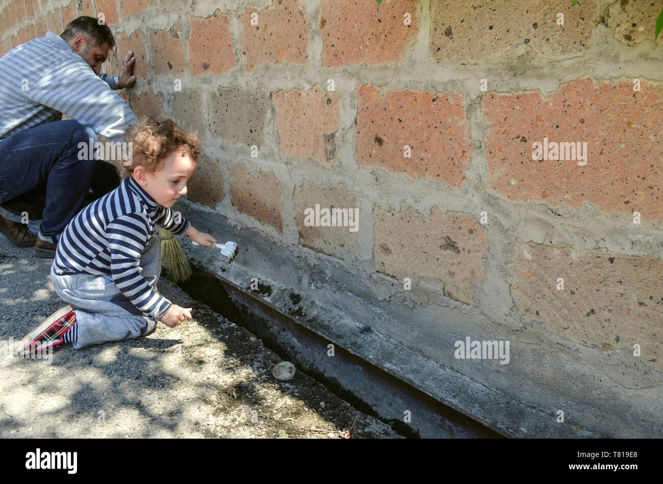 Yerevan, Nerkin Charbakh, Armenia, April 03, 2014:A little boy with a ...