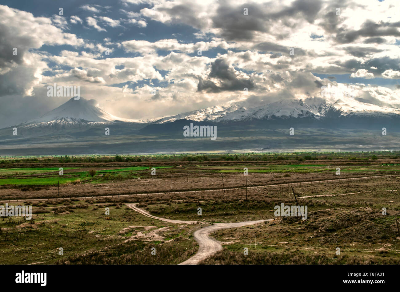 Ararat valley on a spring evening day with overhanging dark storm ...