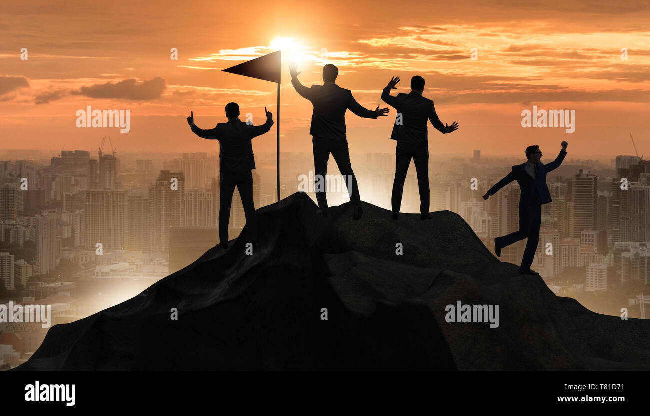 Businessmen in achievement and teamwork concept Stock Photo - Alamy