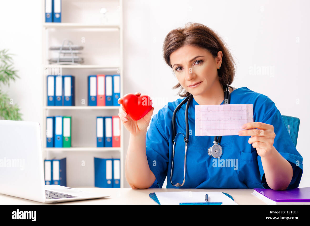 Female doctor cardiologist working in the hospital Stock Photo - Alamy