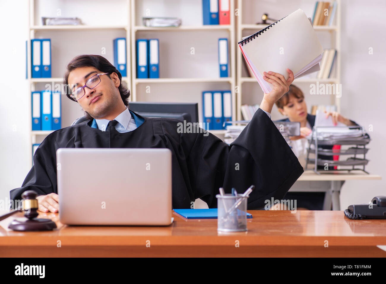 Two lawyers working in the office Stock Photo - Alamy