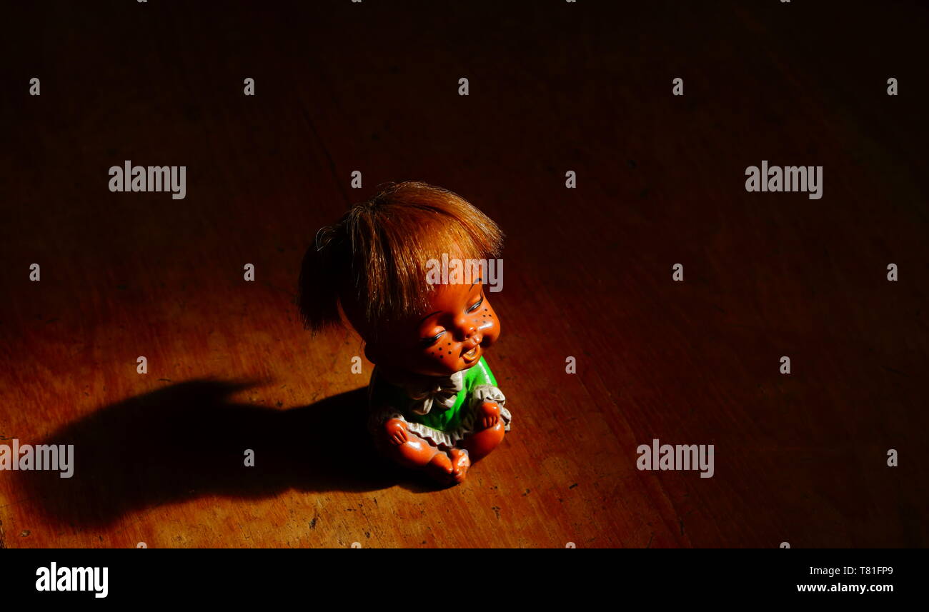 Closeup face of smiling doll under sunlight, hope, happy concept Stock ...