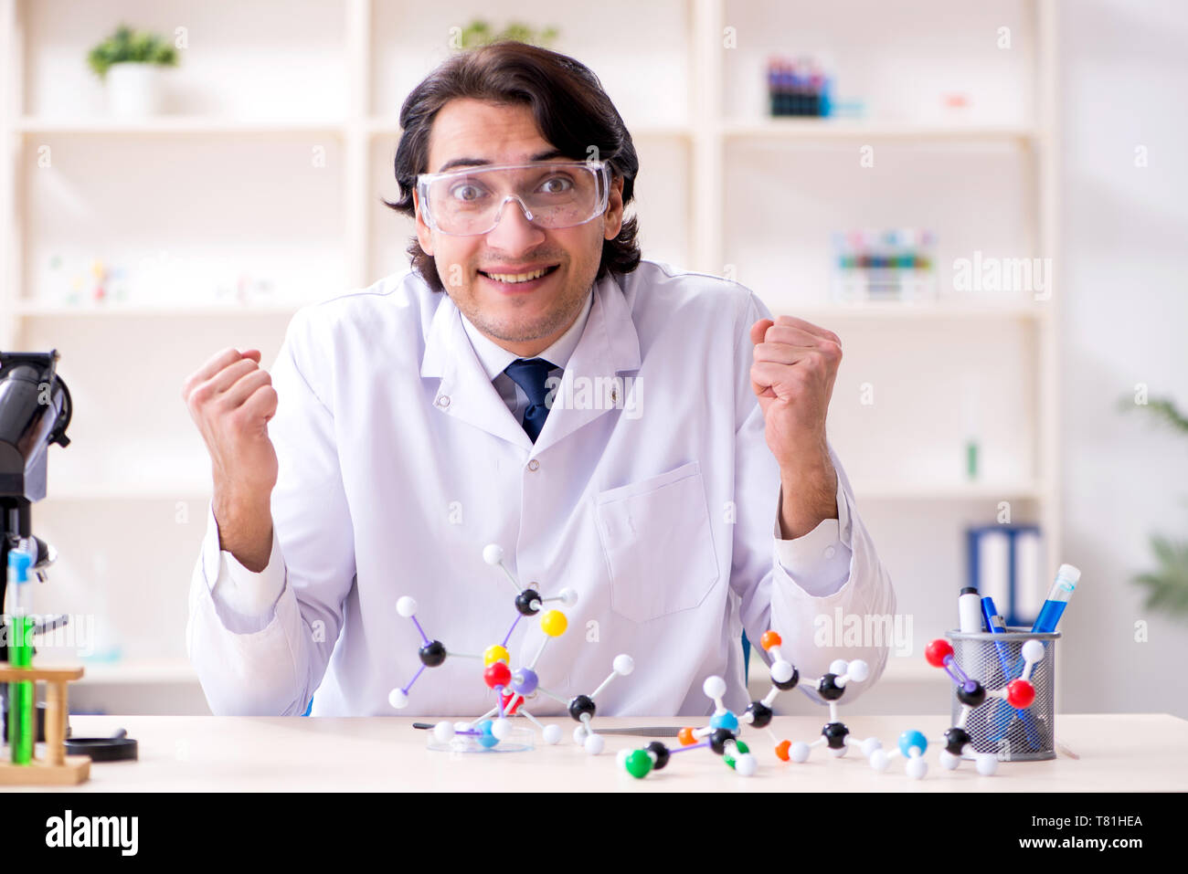 Young male scientist working in the lab Stock Photo - Alamy