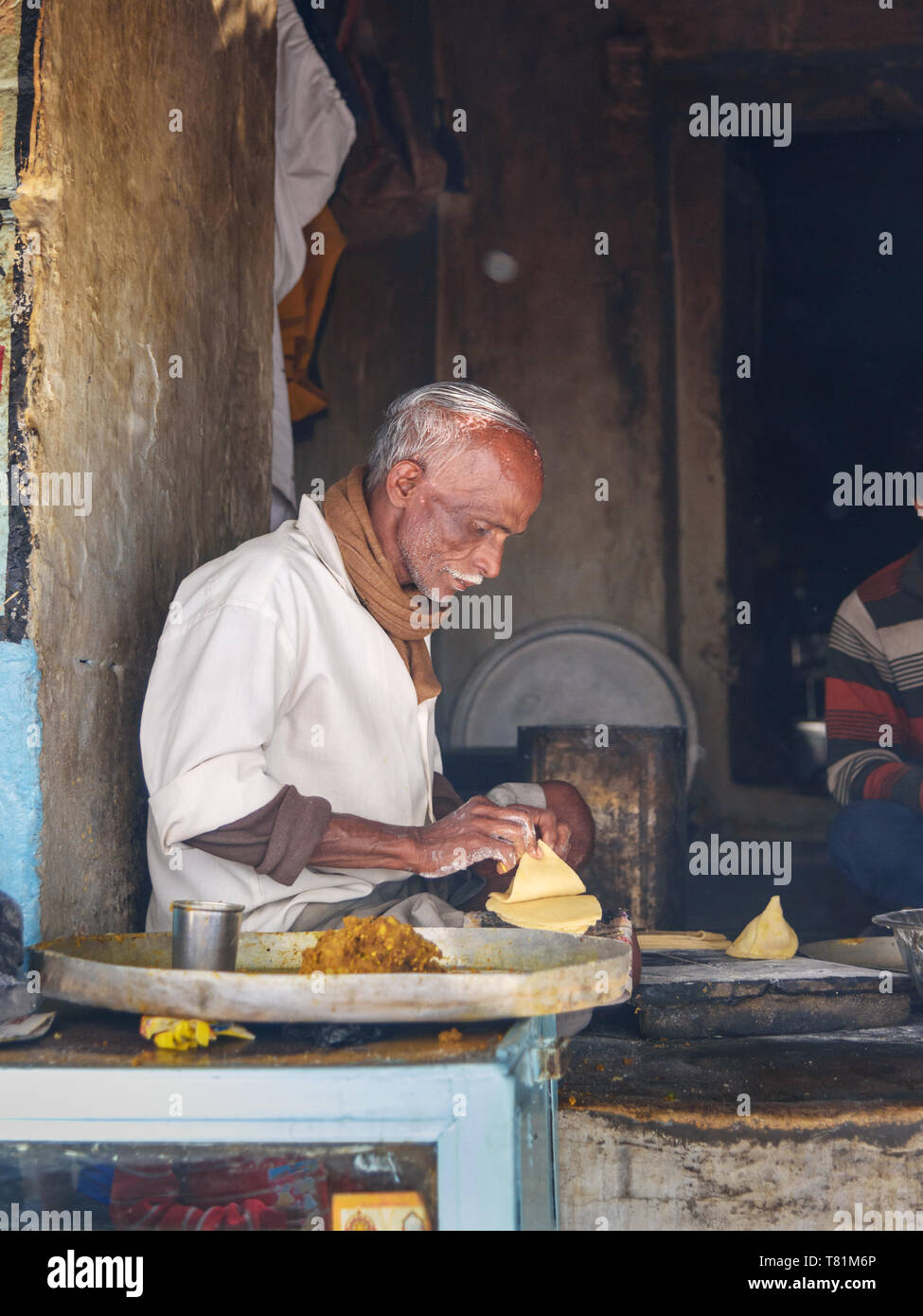 Rural indian village man cooking hi-res stock photography and images ...