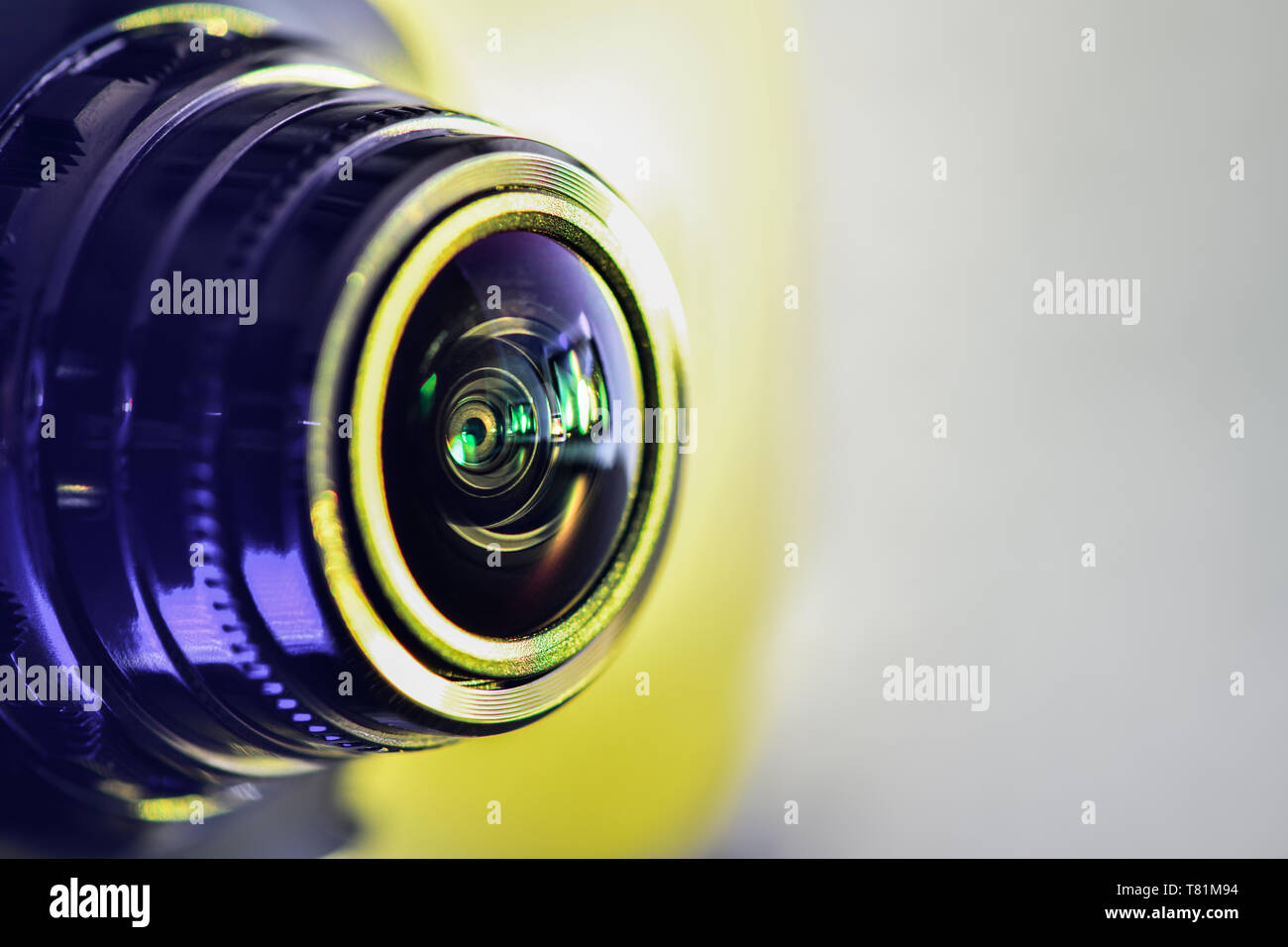 Side view of the camera with yellow backlight. Horizontal photography ...