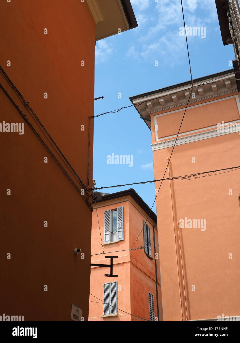 View of a colourful collection of traditional buildings at a street ...