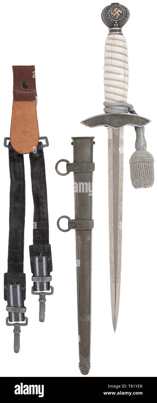 An officer's dagger M 37 with ivory grip and etched blade. Plated blade ...