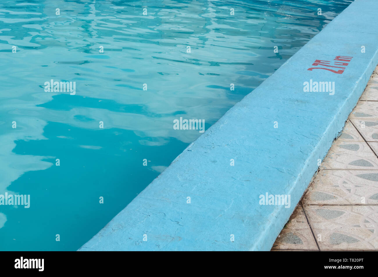 Refreshing cool blue swimming pool, with 2.70m marking Stock Photo - Alamy