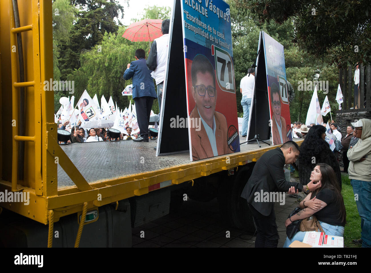 An election rally in Quito Ecuador,fireworks,dancers,and speeches,flags ...