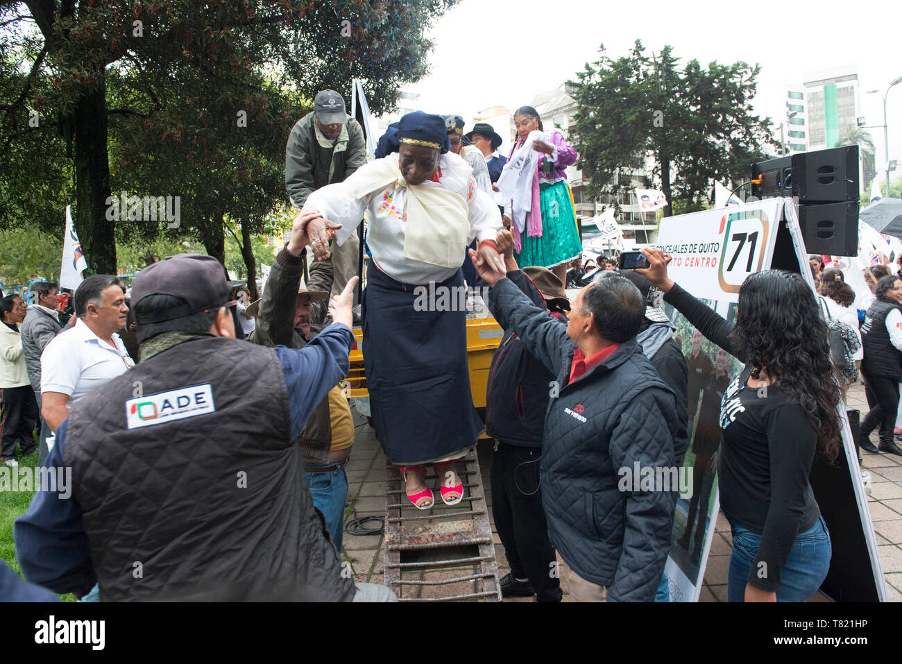 An election rally in Quito Ecuador,fireworks,dancers,and speeches,flags ...