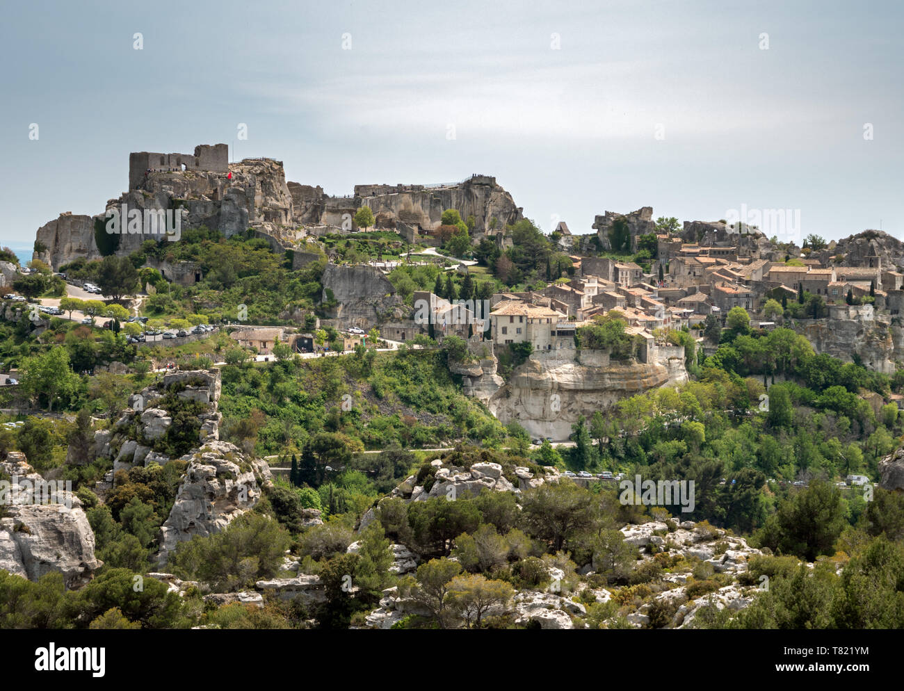 An old french castle town stands at the tops of a Rugged cliff ...