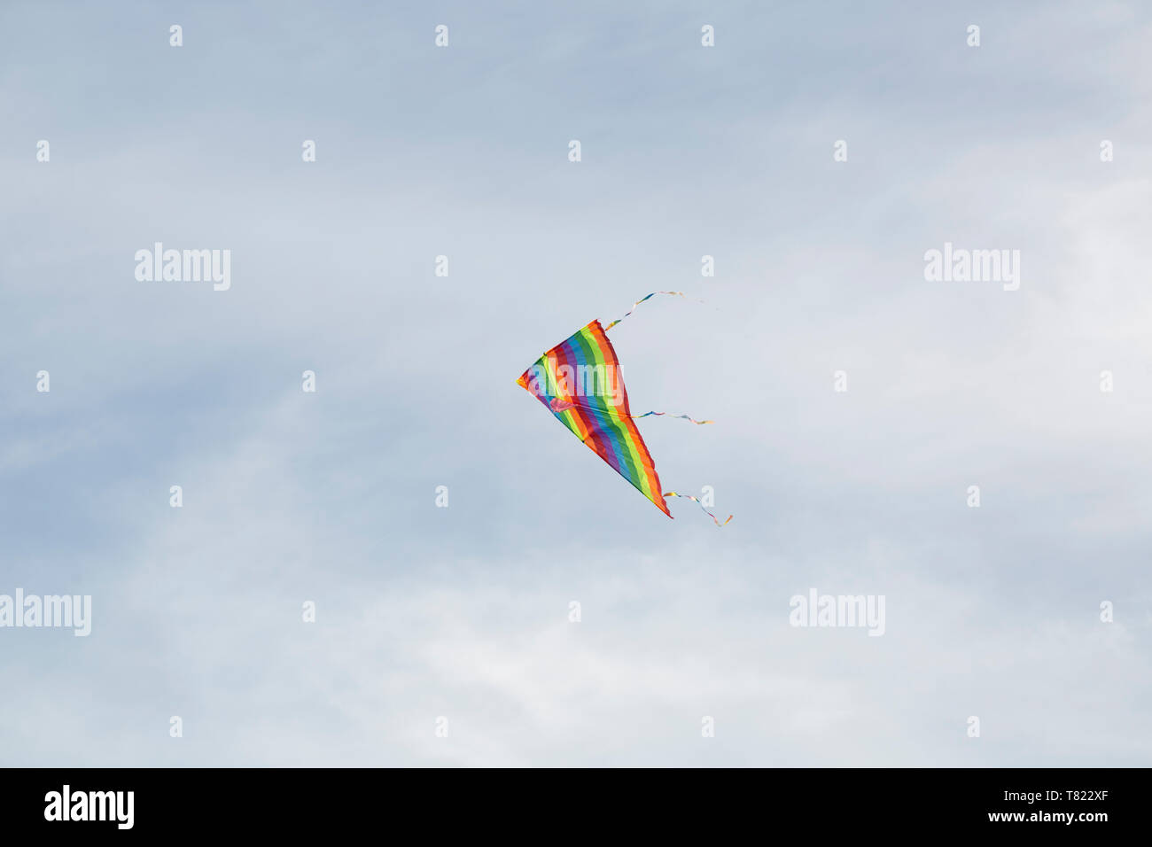 Kite cloud sky child joy fun colors children people Stock Photo - Alamy