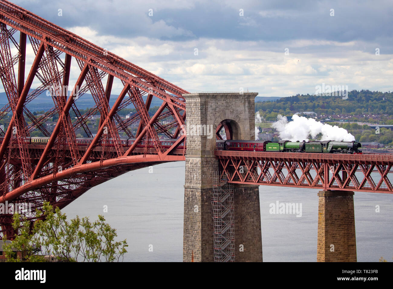 The Flying Scotsman steam train crosses the Forth Bridge on its way ...