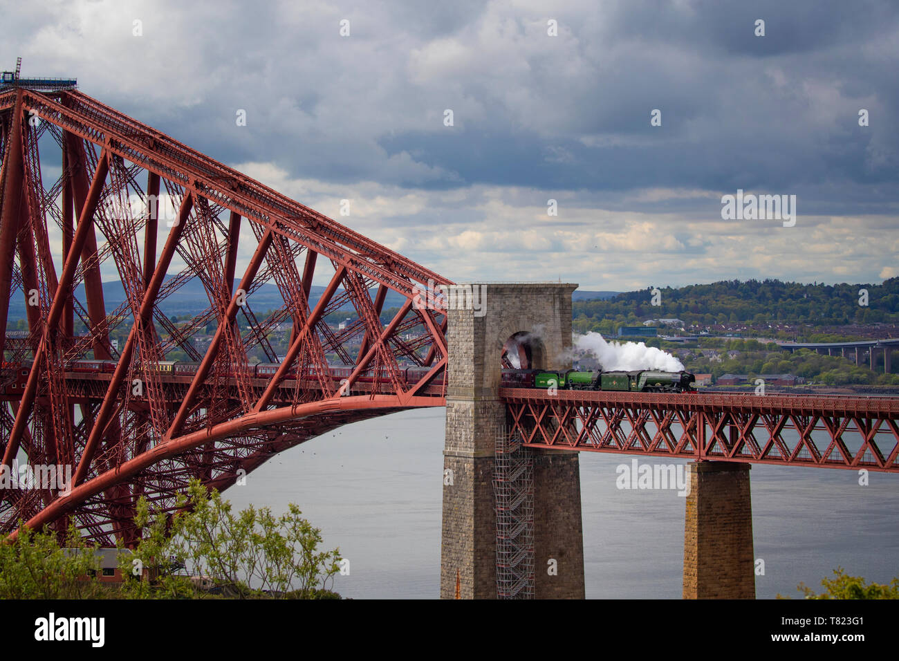 The Flying Scotsman steam train crosses the Forth Bridge on its way ...