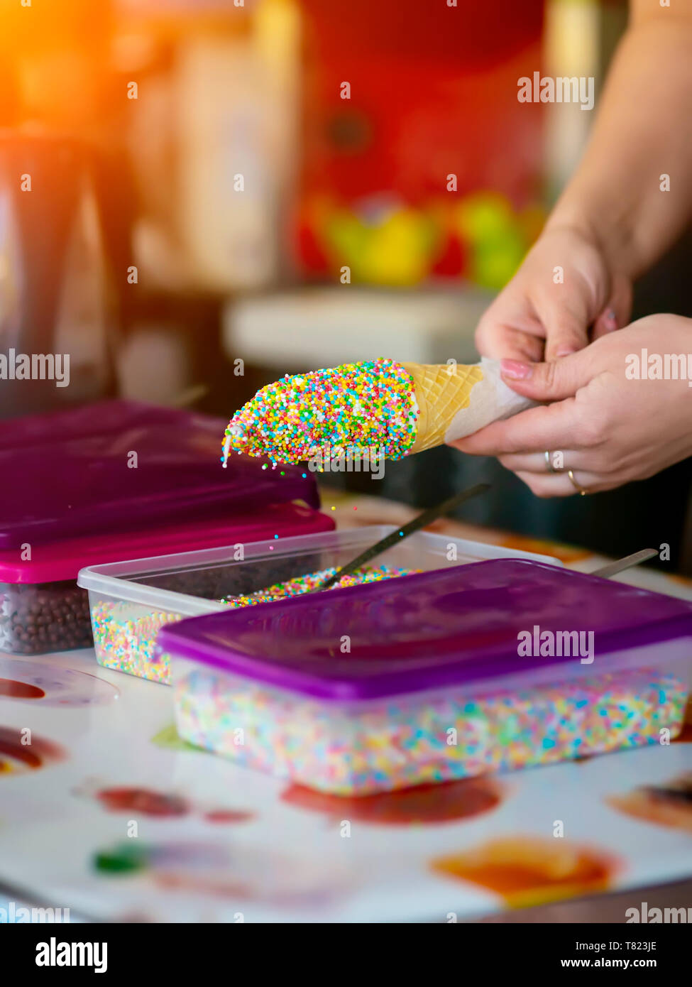 Cheerful girl ice cream in cup hi-res stock photography and images - Alamy
