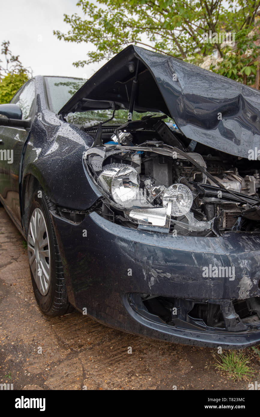 Car crash, blue/grey Volkswagen Golf vehicle Police tape and damage ...