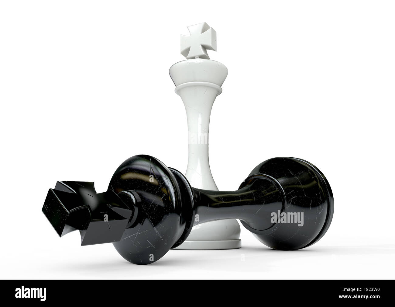 A white plastic chess king standing over the fallen black king on an ...