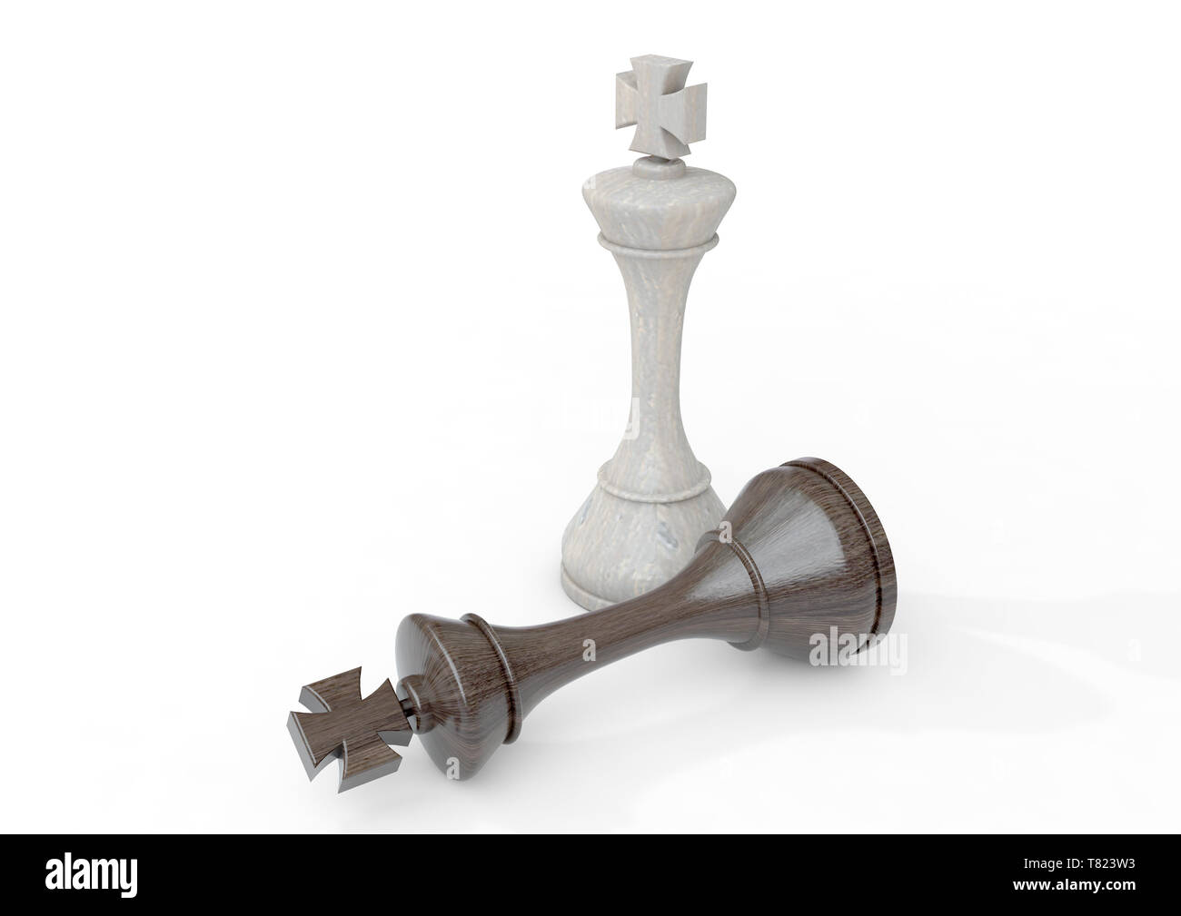 A white wooden chess king standing over the fallen black king on an ...