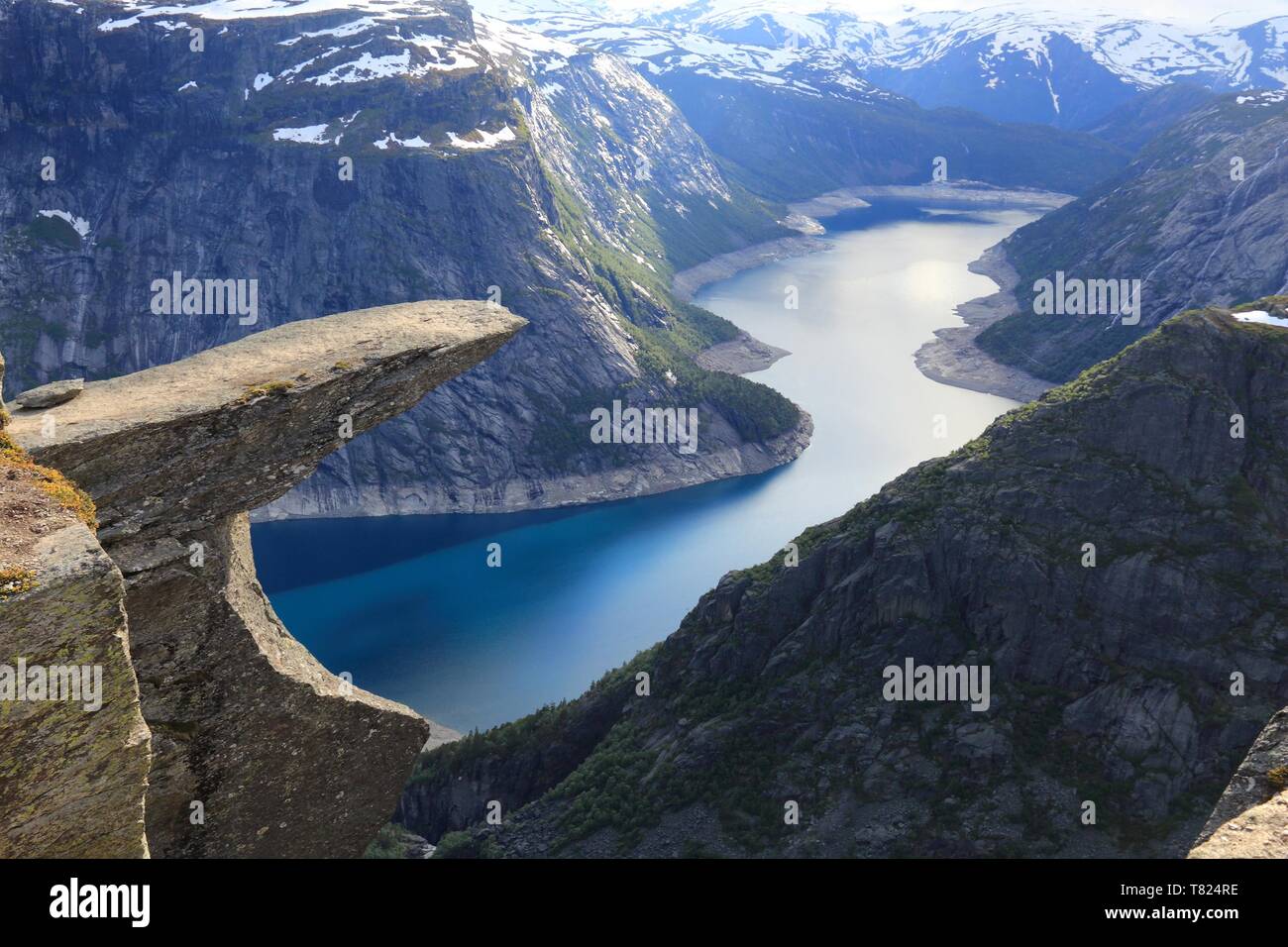Troll's Tongue in Norway. Tourist attraction known as Trolltunga. Rock ...