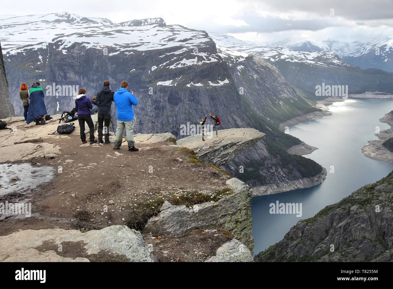 TROLLTUNGA, NORWAY - JULY 16, 2015: Travelers visit Troll's Tongue ...