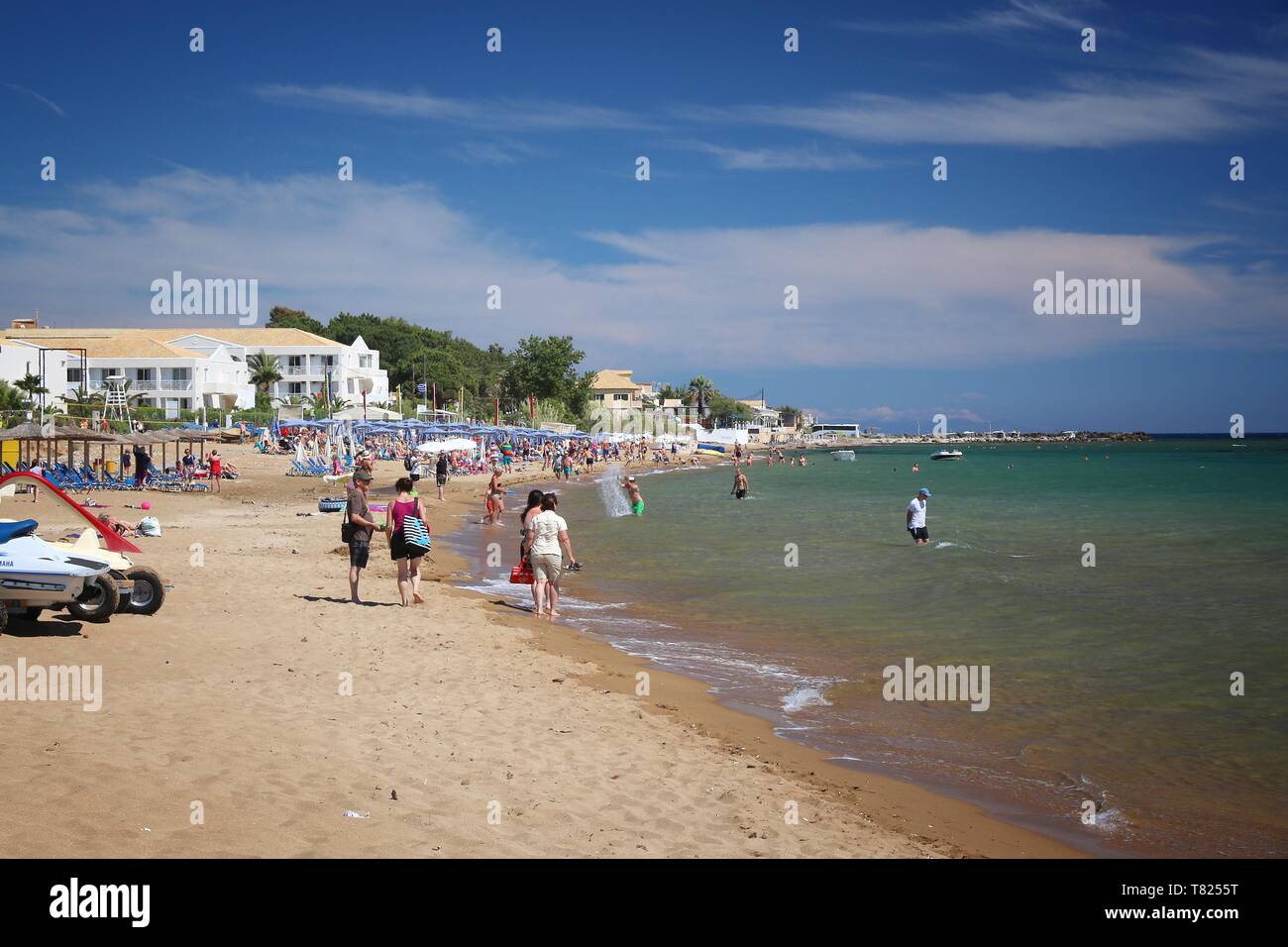 CORFU, GREECE - JUNE 4, 2016: People enjoy the beach in Issos, Corfu ...