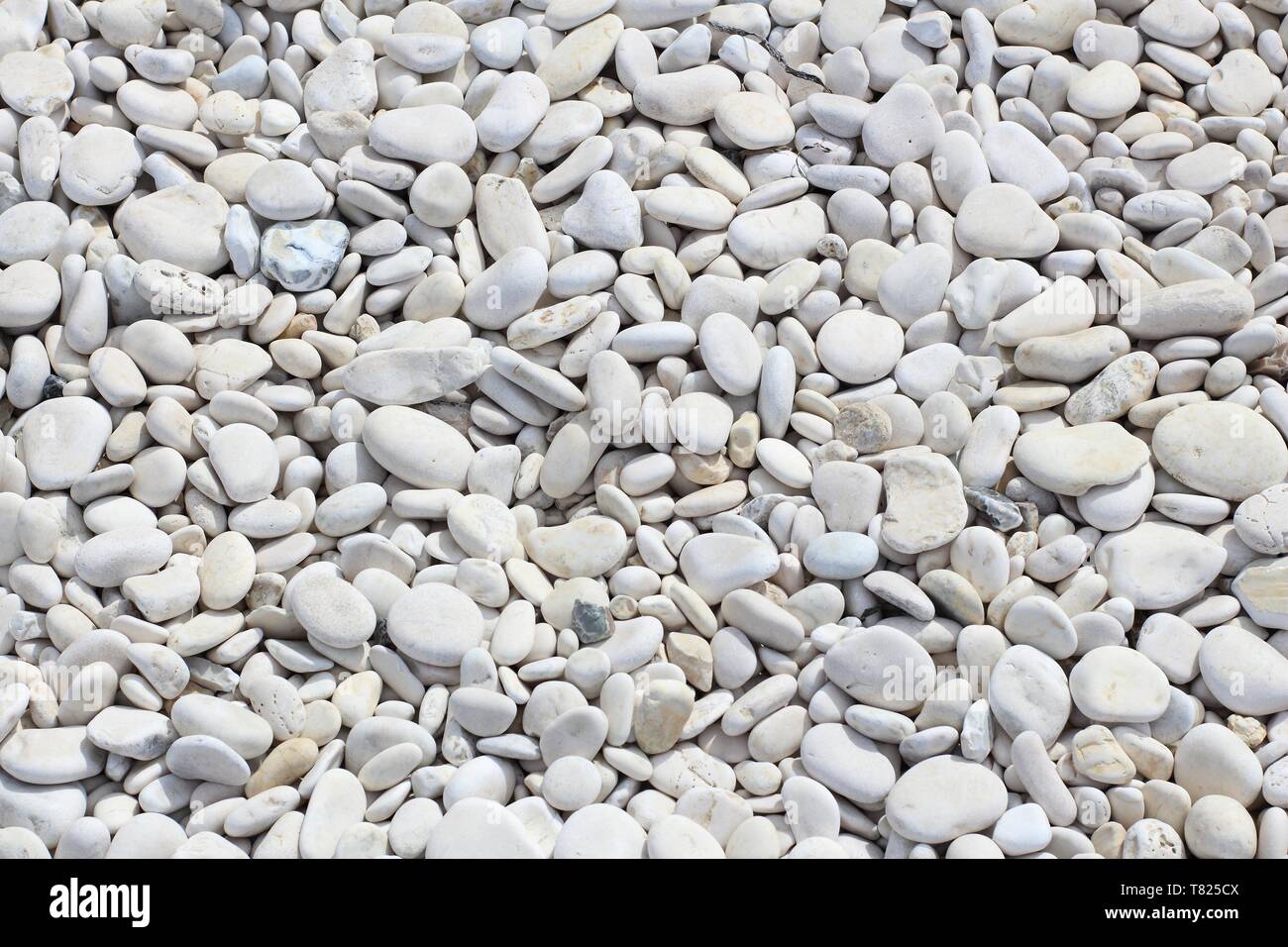 White zen background - pebble beach in Corfu island, Greece Stock Photo ...