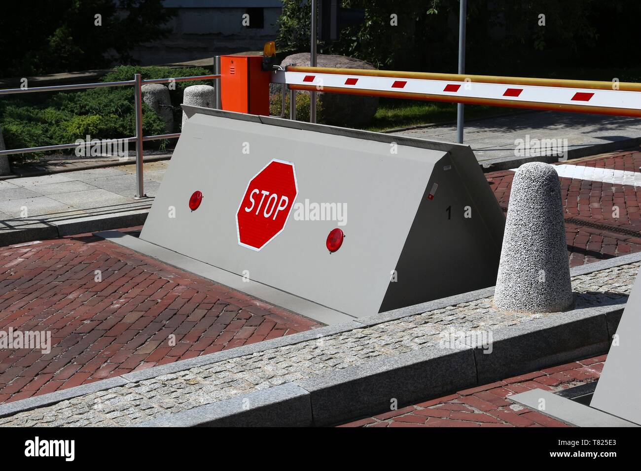 Road blockade - anti terrorism measure. Anti-ram automatic roadblocker ...