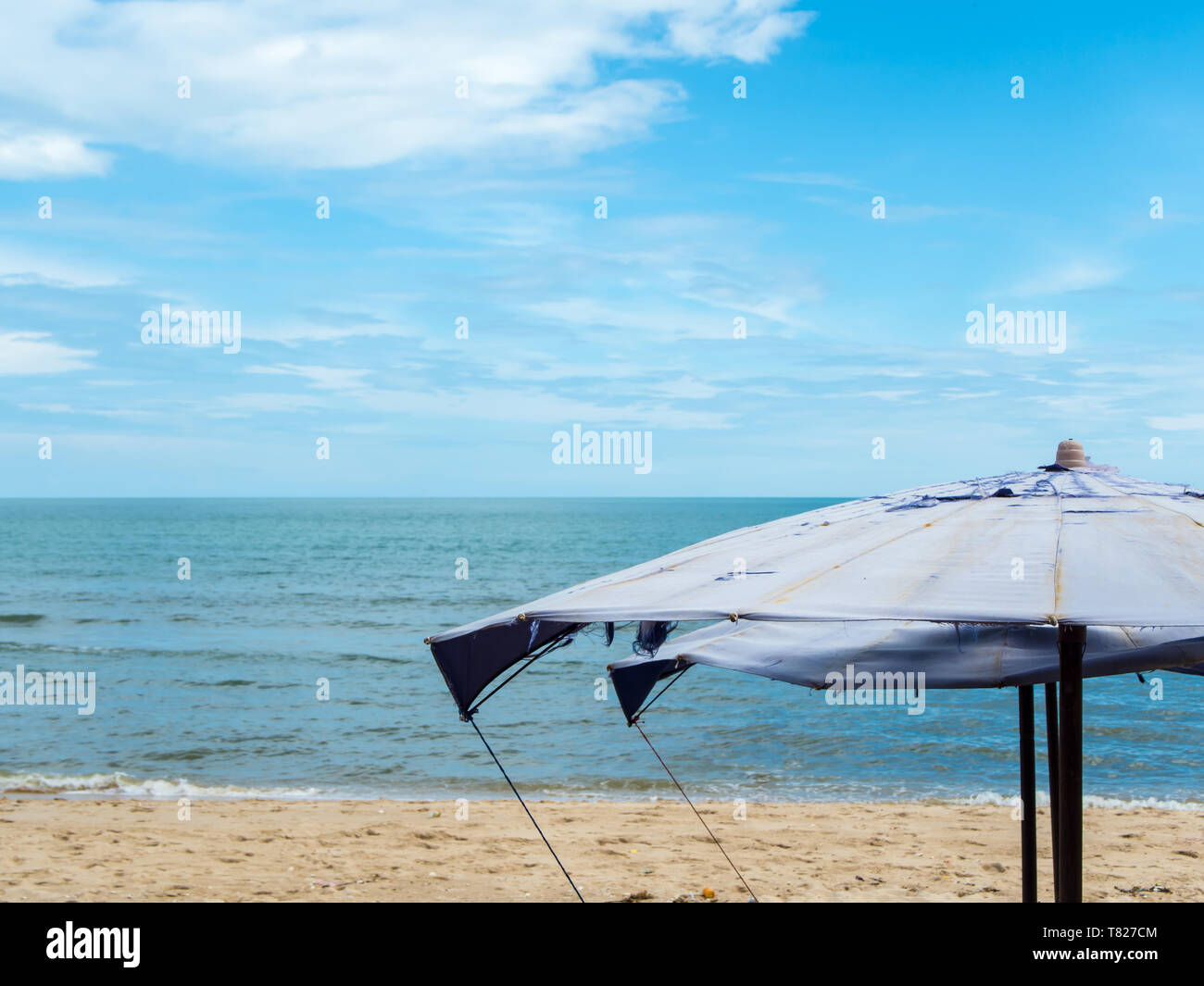 Large umbrella at the beach Stock Photo - Alamy